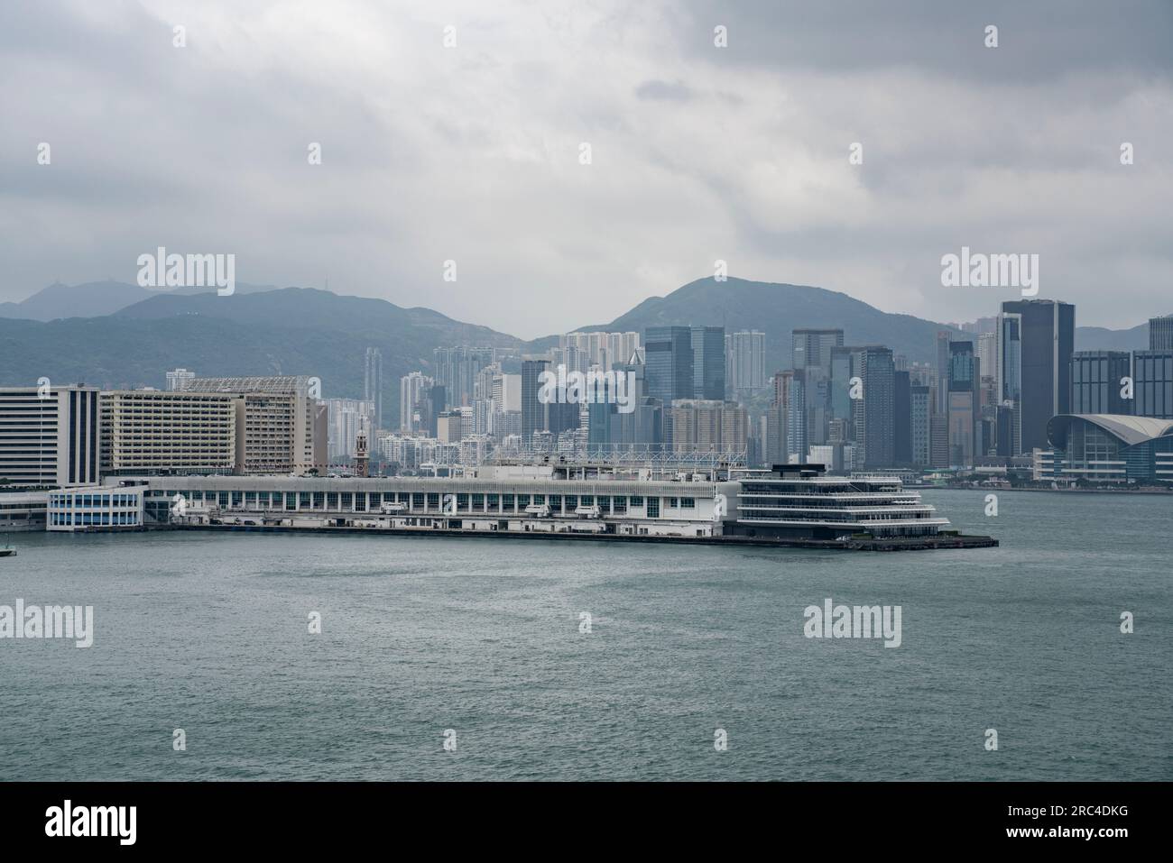 The tall financial center building and surrounding bustling buildings ...