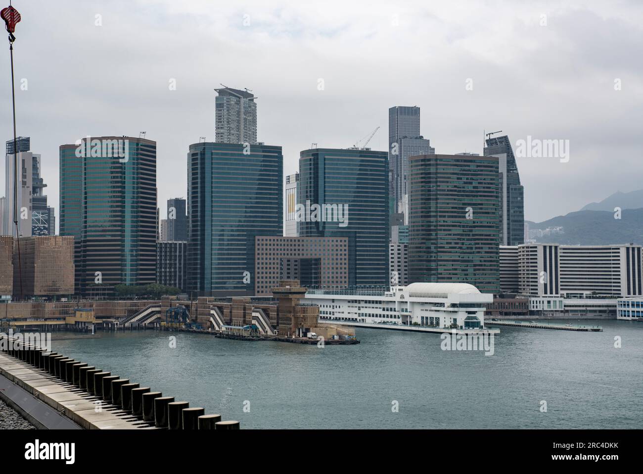 The tall financial center building and surrounding bustling buildings ...