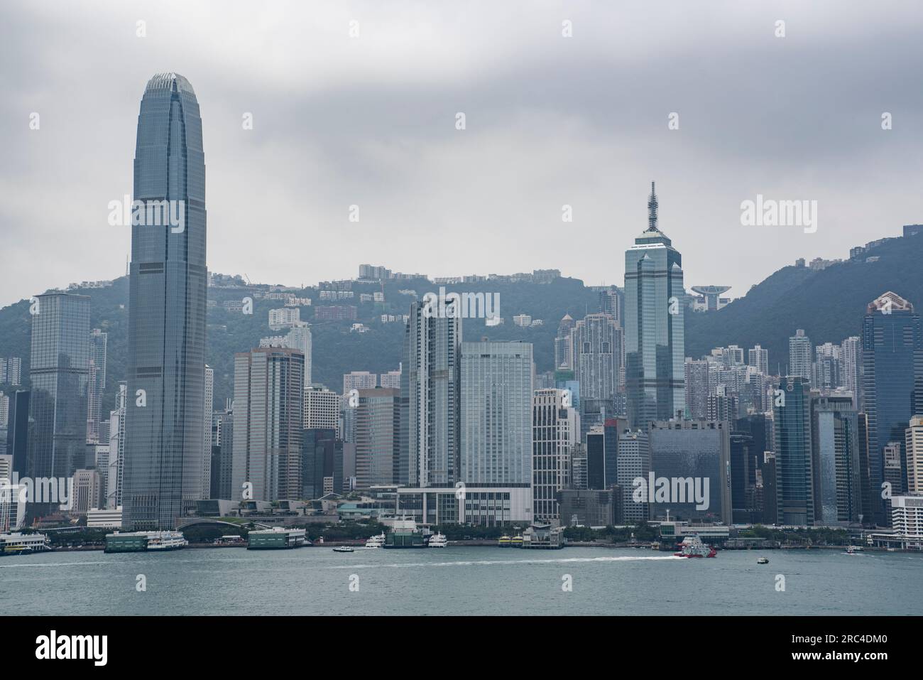 The tall financial center building and surrounding bustling buildings ...