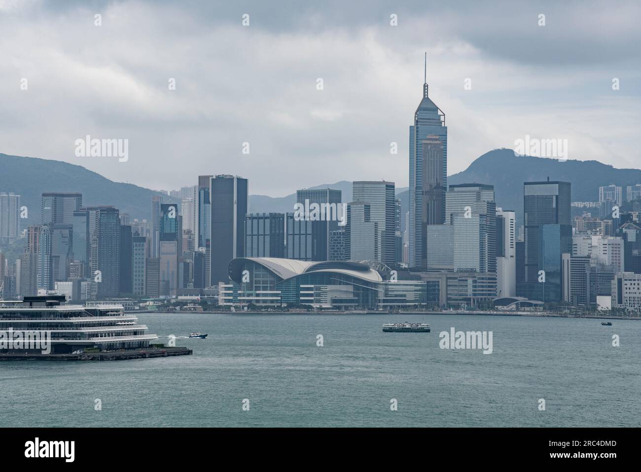 The tall financial center building and surrounding bustling buildings ...