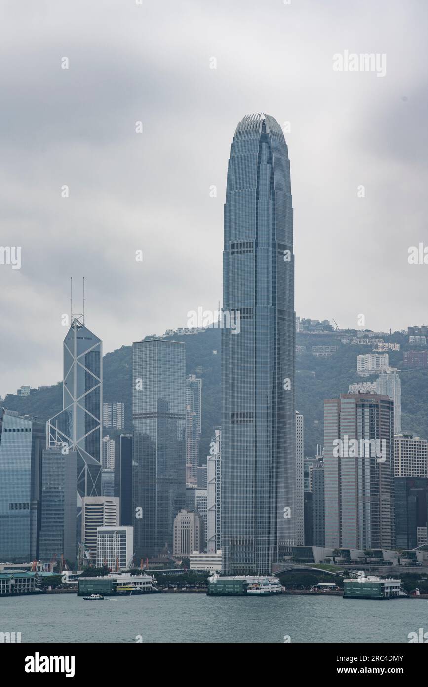 The tall financial center building and surrounding bustling buildings ...