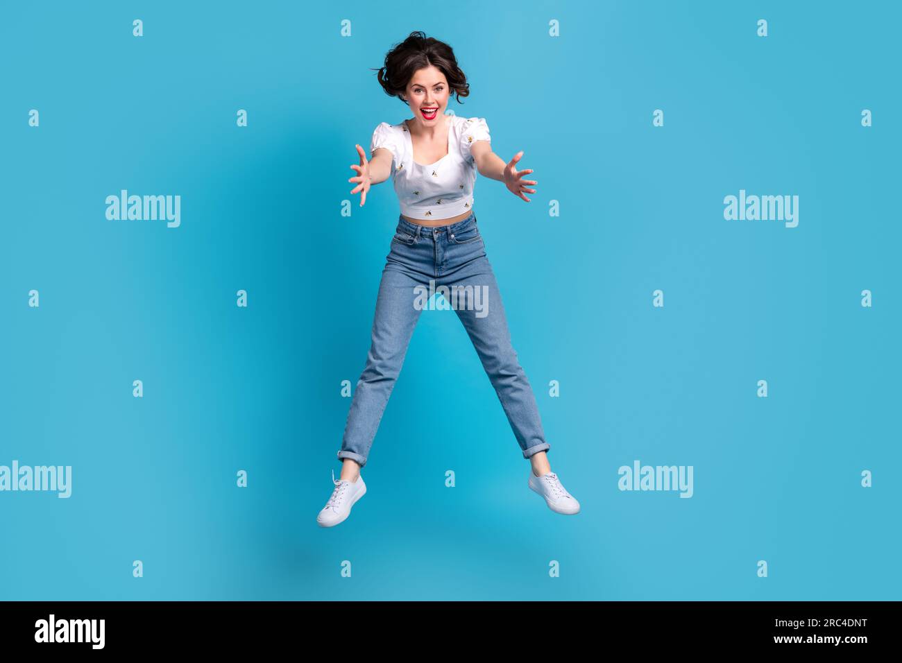 Full length photo of active overjoyed pretty person jumping falling ...