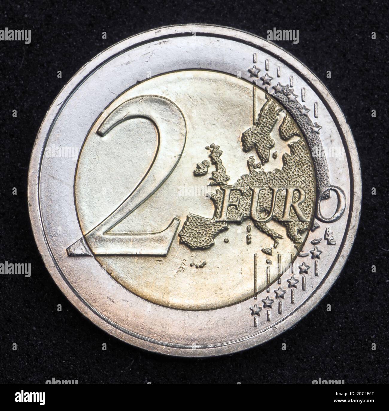 Common side of 2 Euro coin shows map of Europe, with a background ...