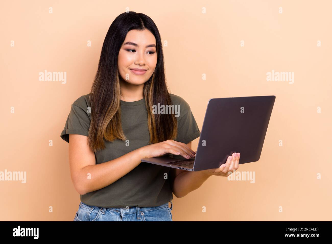 Portrait of pretty indonesian lady use wireless netbook coworking write ...