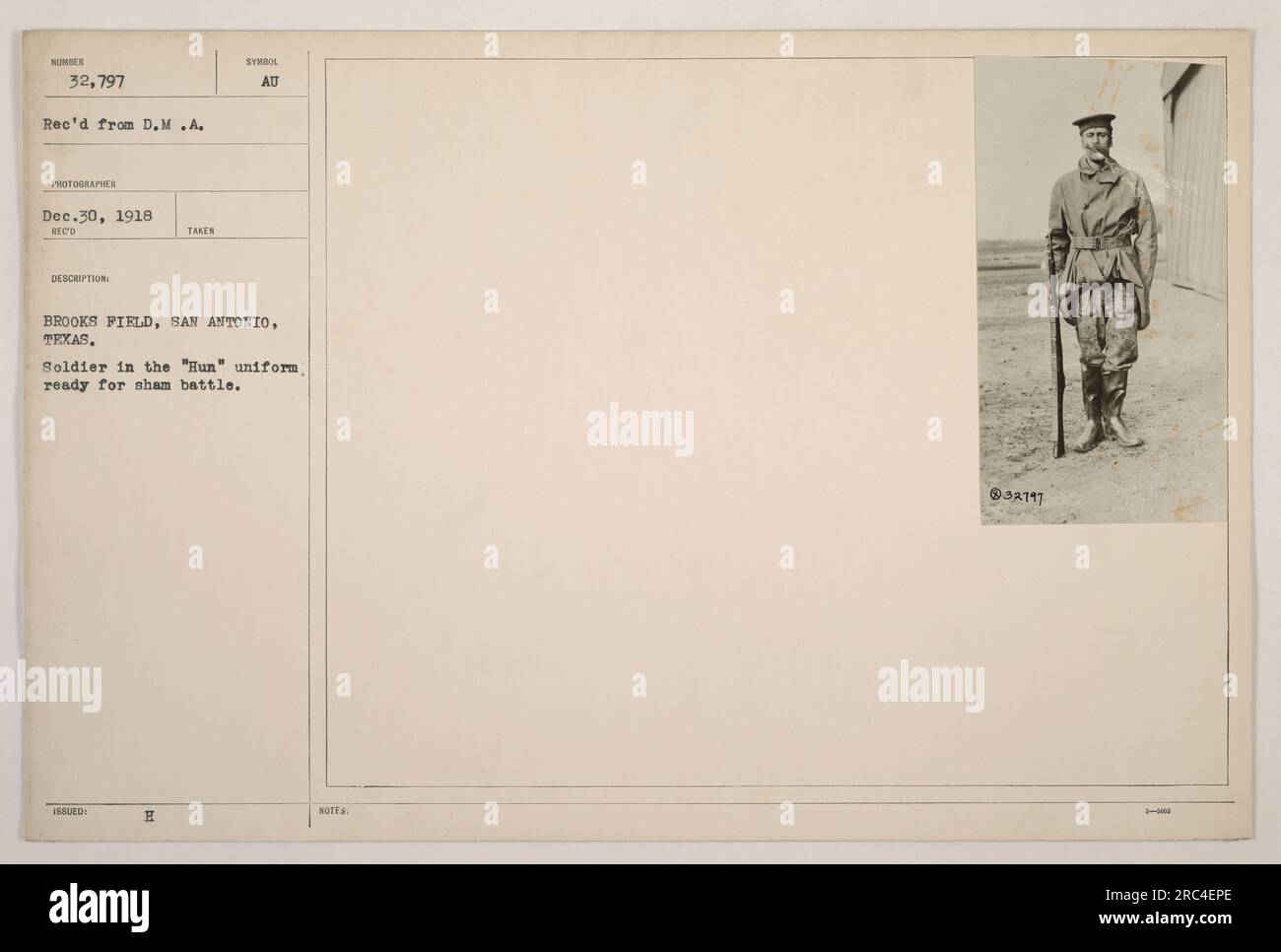 A soldier in "Hun" uniform standing ready for a sham battle at Brooks ...