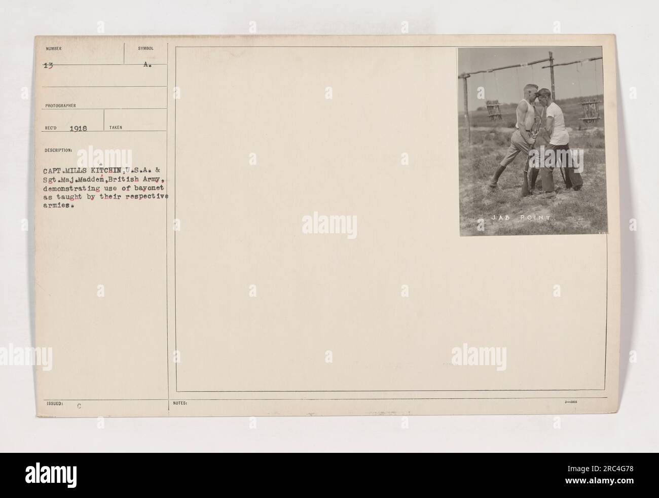 Capt. Mills Kitchen (USA) and Sgt. Major Madden (British Army) display ...