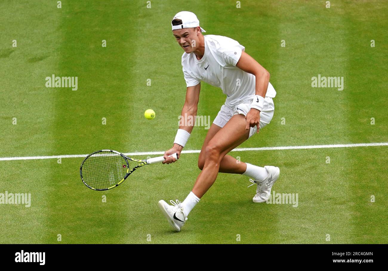 Holger Rune in action against Carlos Alcaraz during their gentlemen's ...