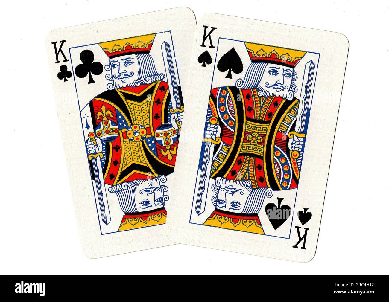 Vintage playing cards showing a pair of kings on a white background ...