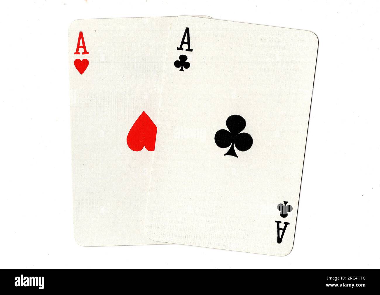 Vintage playing cards showing a pair of aces on a white background ...