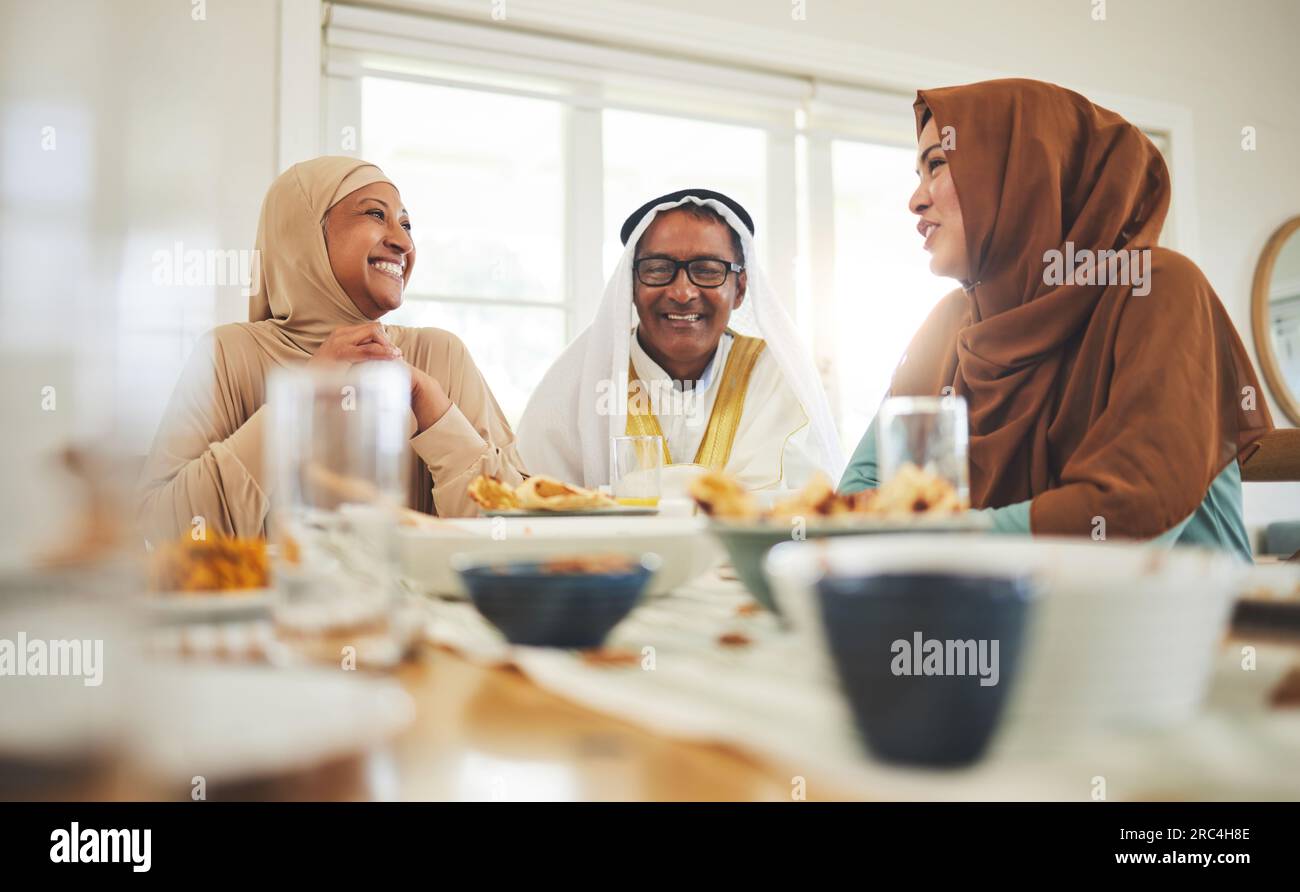 Food, conversation and muslim with big family at table for eid mubarak ...