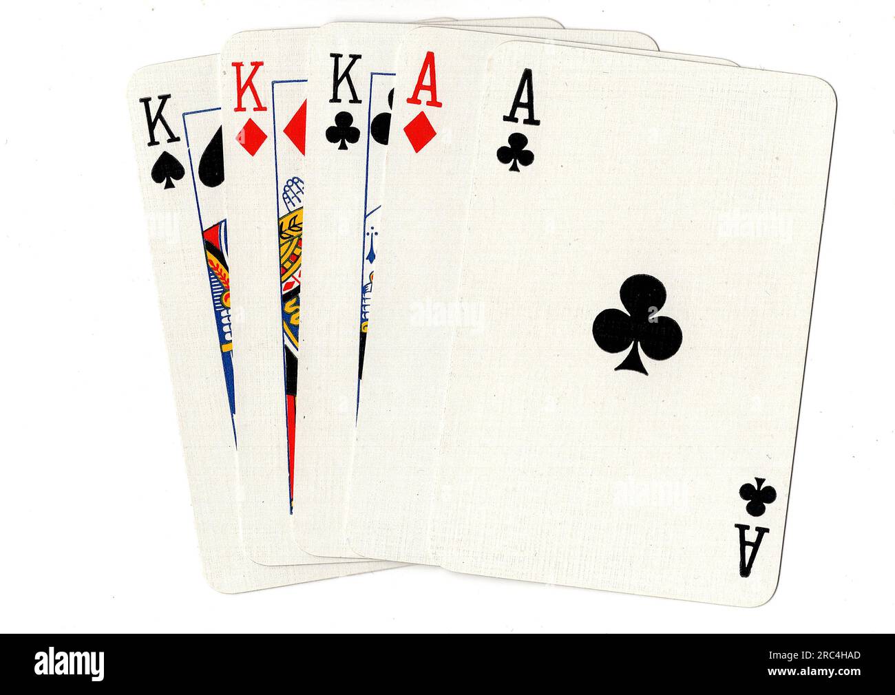 A poker hand of playing cards showing a full house of kings and aces on ...