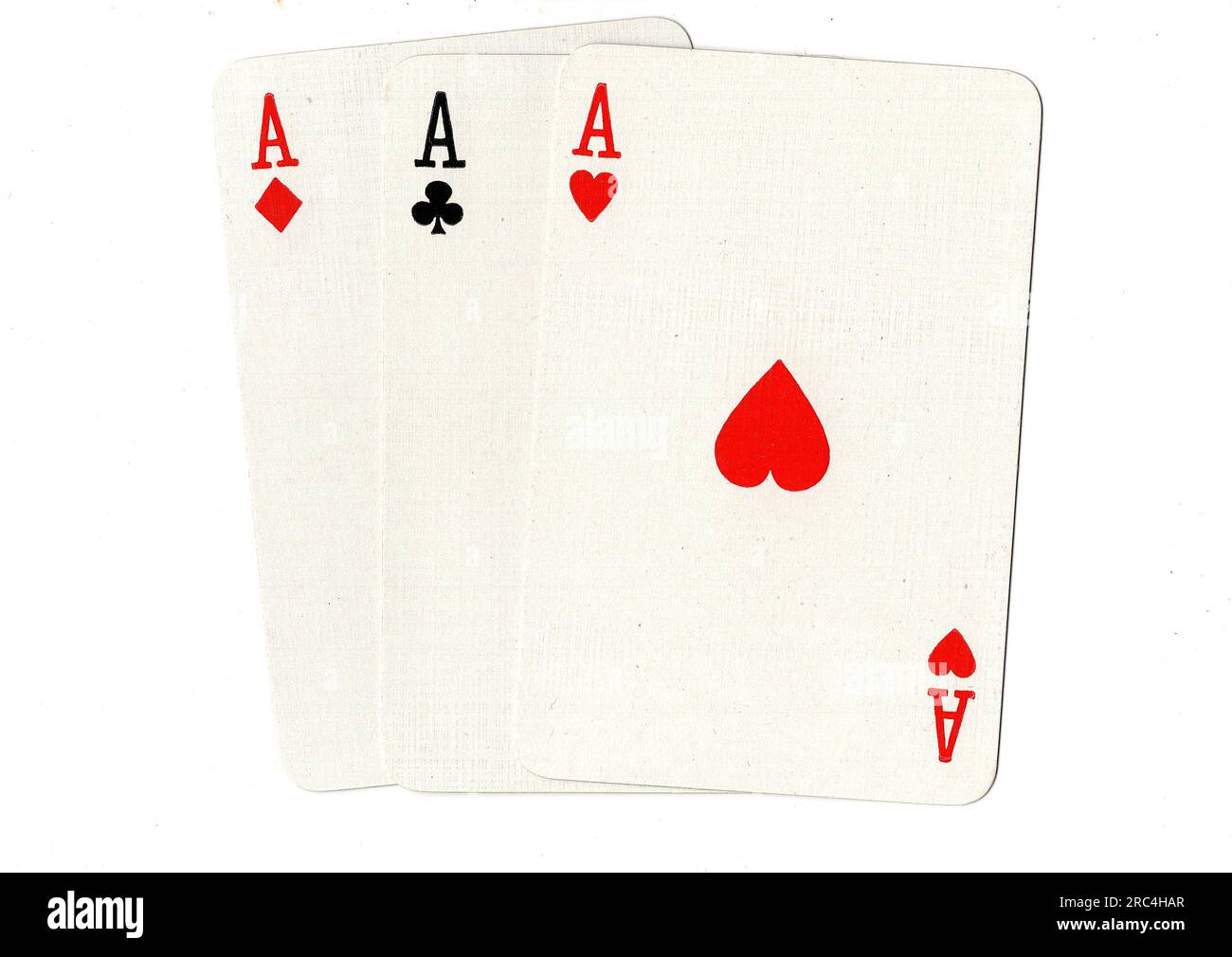 Vintage playing cards showing three aces on a white background Stock ...