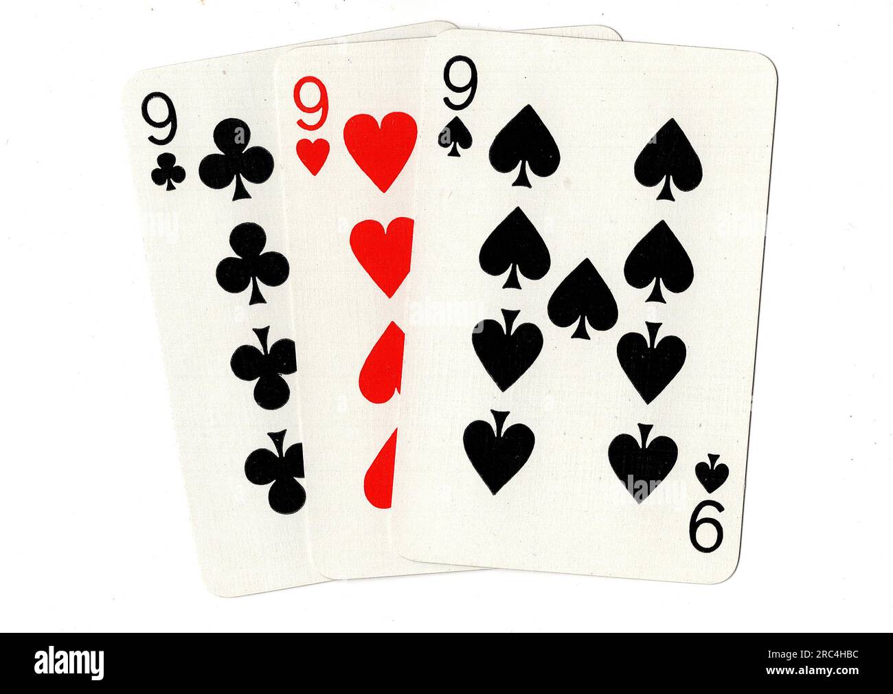 Vintage playing cards showing three nines on a white background Stock Photo - Alamy