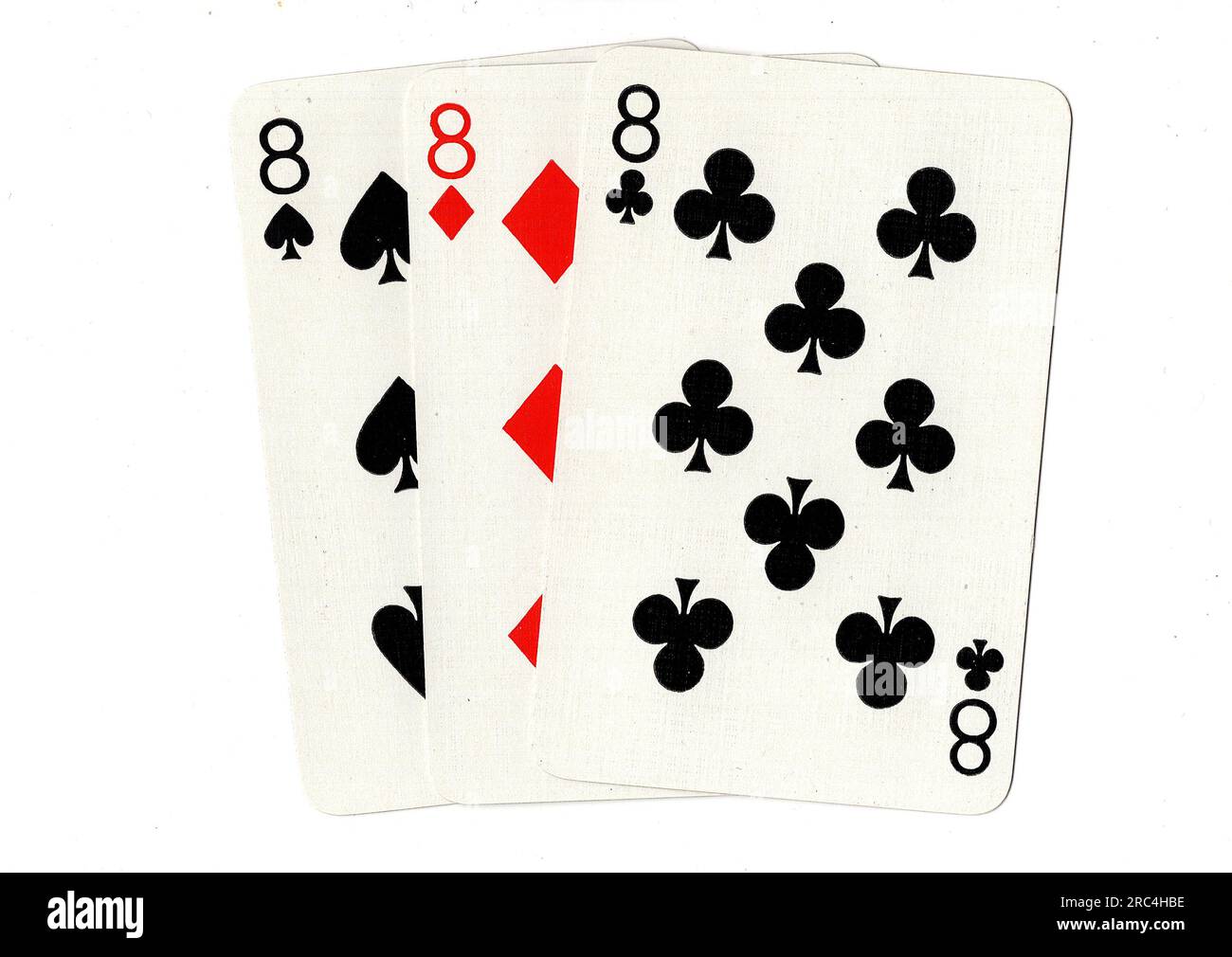 Vintage playing cards showing three eights on a white background Stock ...