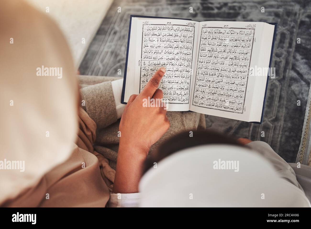 Prayer, muslim and Quran with child and learning for eid mubarak, God ...