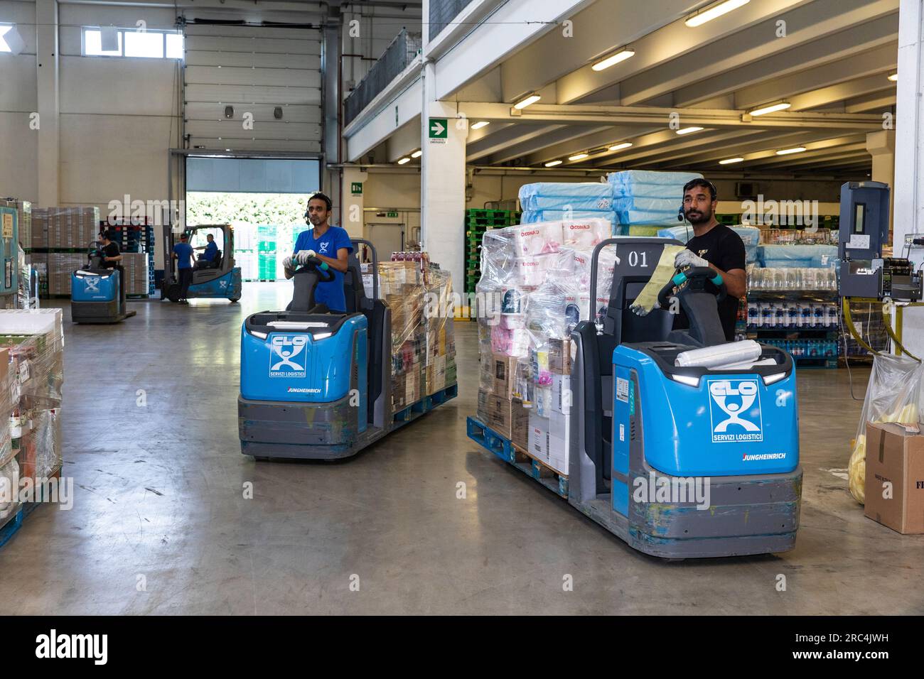 worker on the forklift that loads and distributes the food for the ...