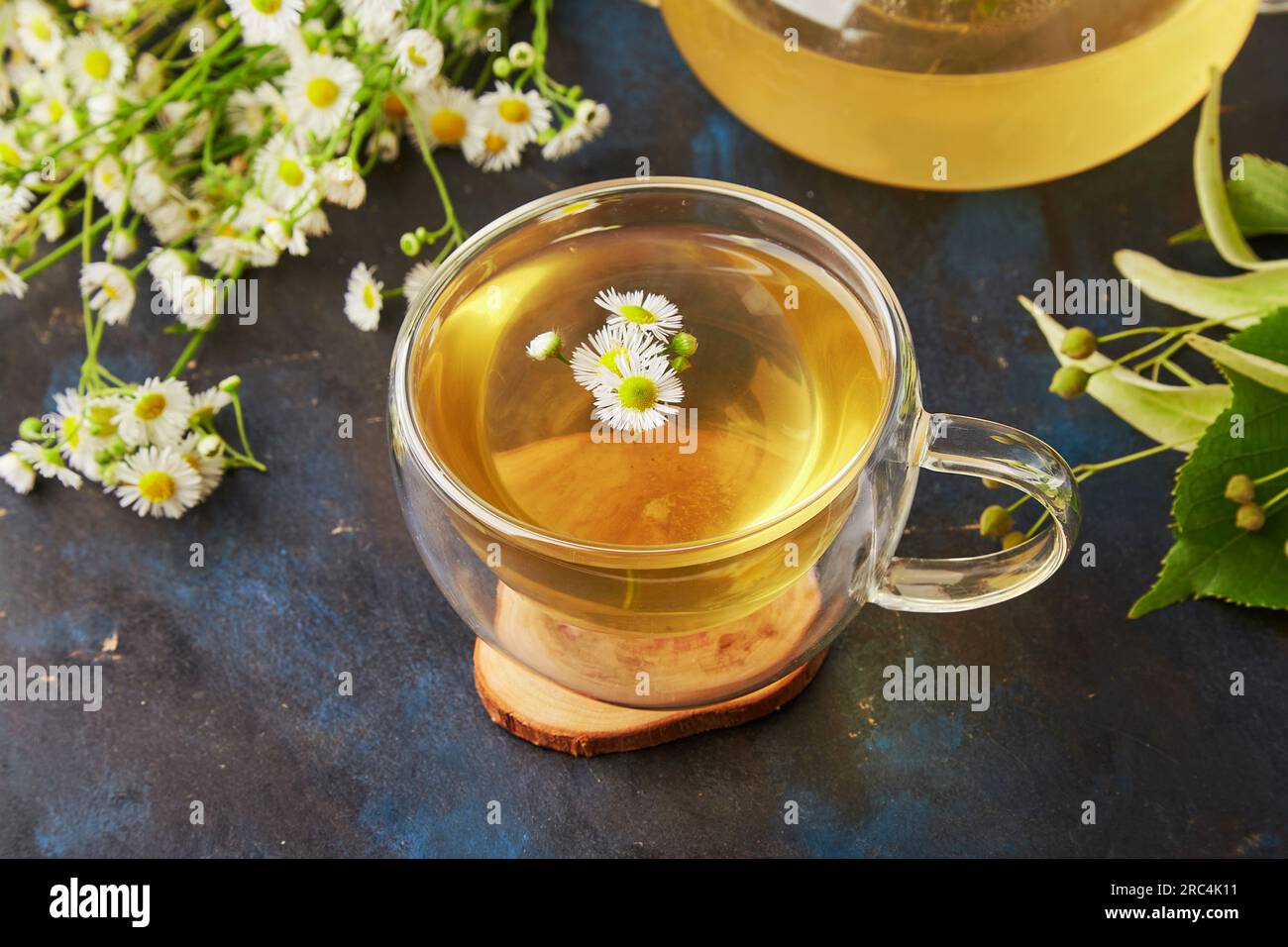 Cup of healthy natural organic linden, chamomile tea blossoms. Natural ...