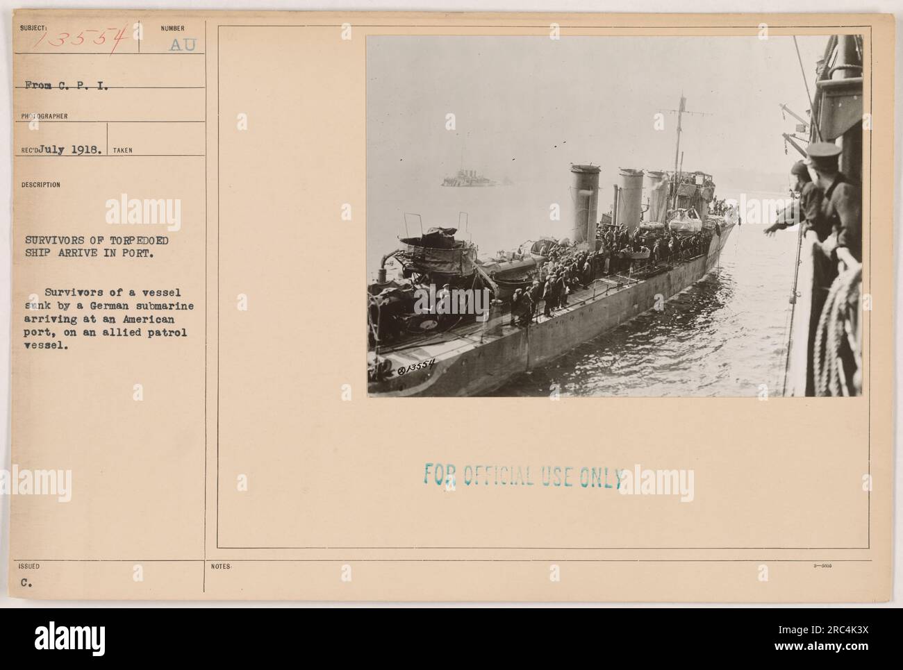 Survivors of a torpedoed ship arrive at an American port onboard an ...