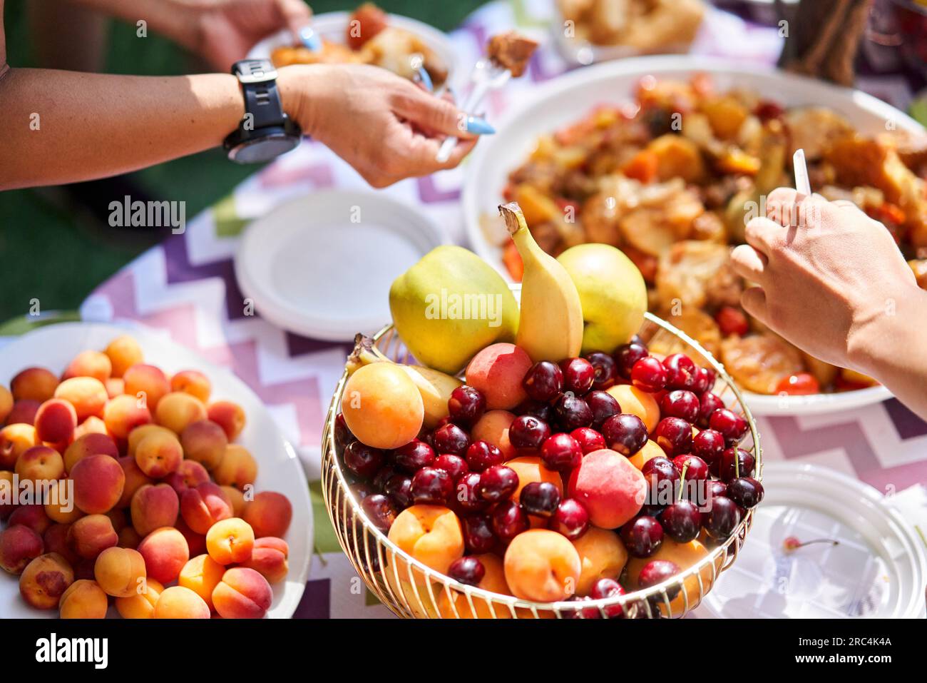 Buffet in the open air. Fresh fruits and traditional Uzbek cuisine ...