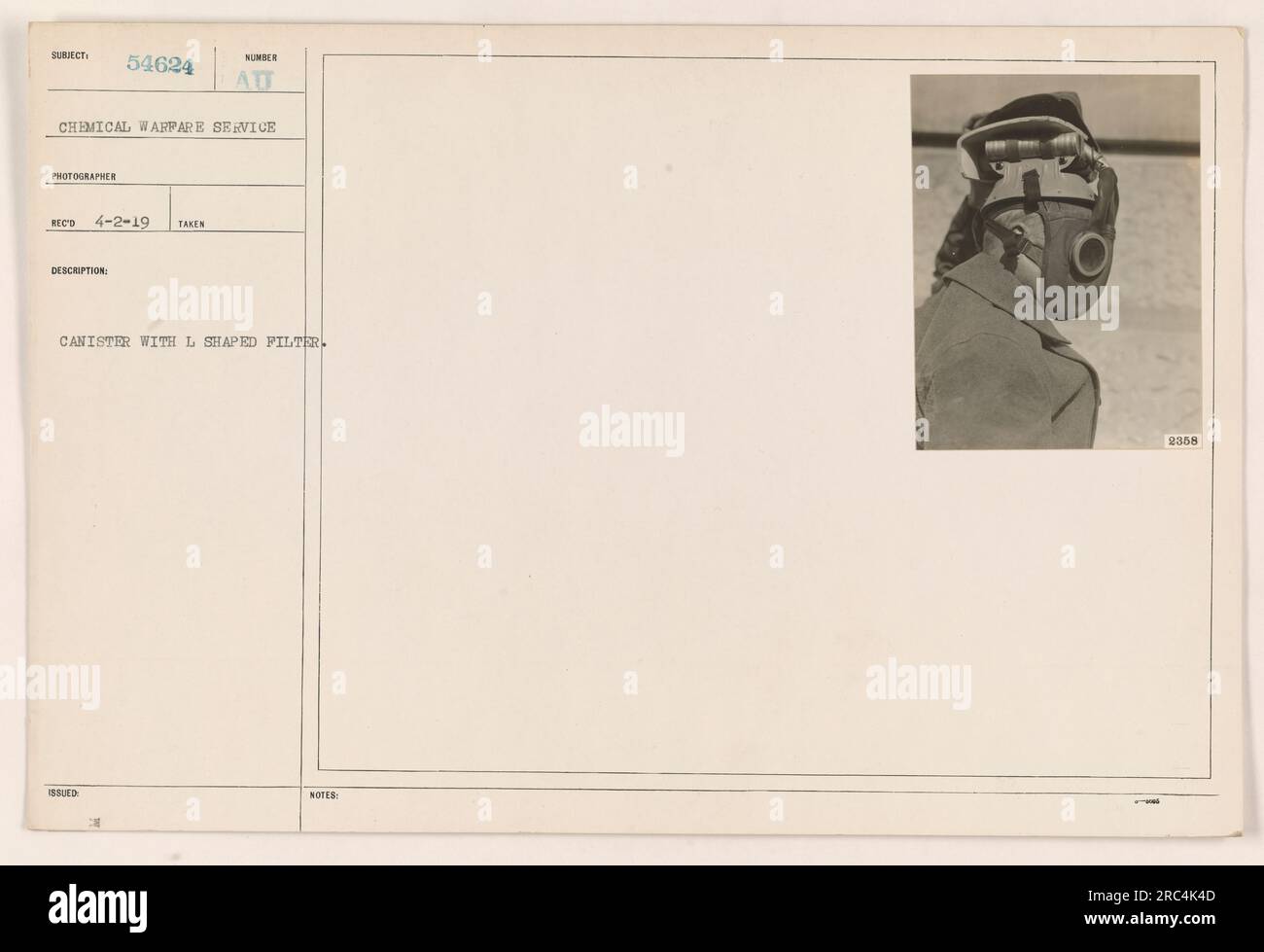 Photographer from the Chemical Warfare Service captures an image ...