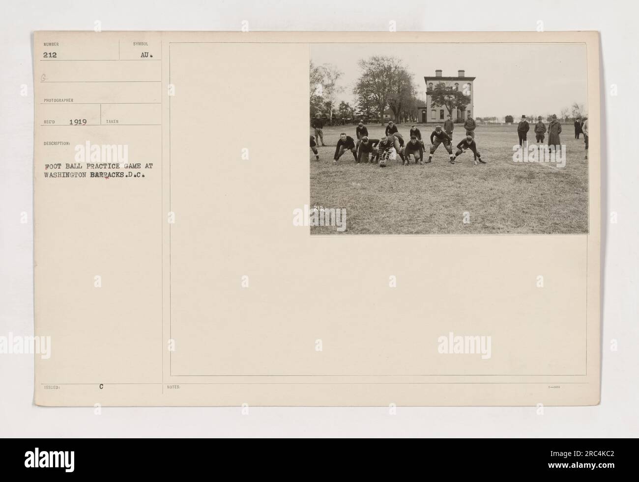 Members of the American military engage in a football practice game at ...
