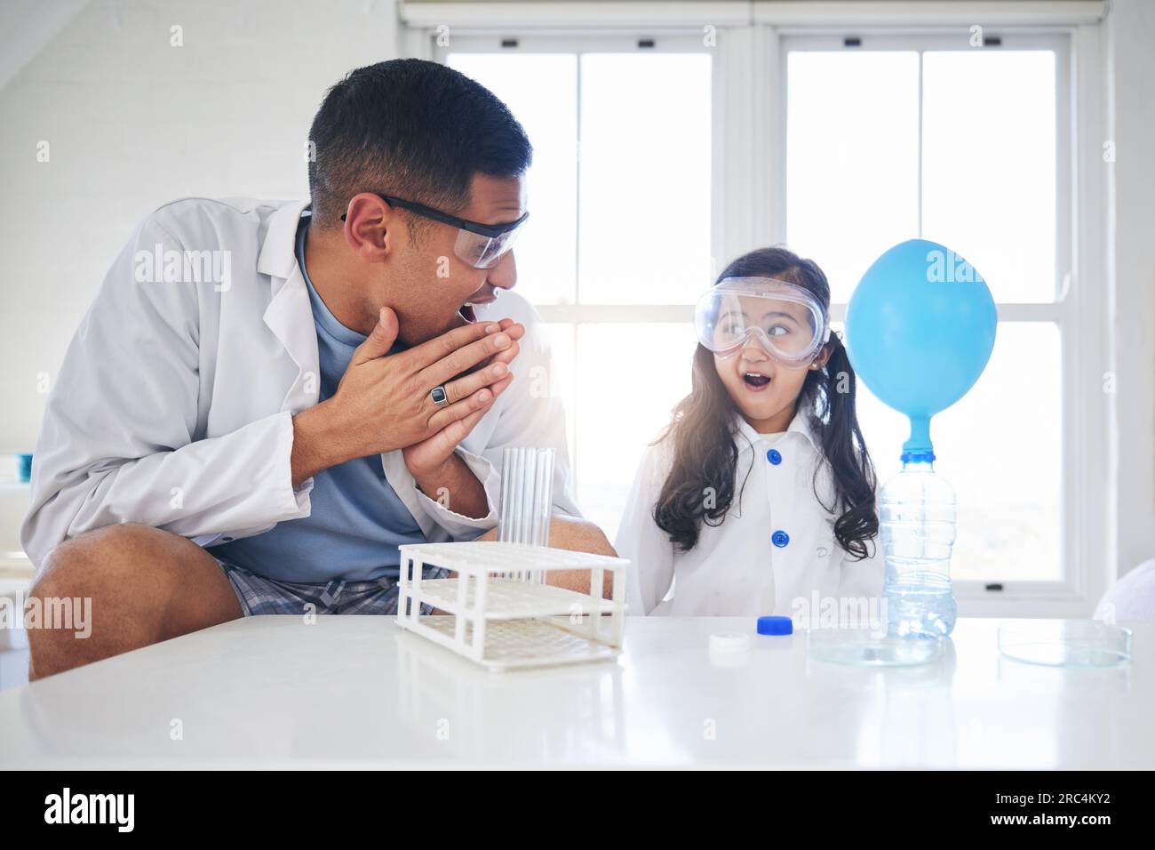 Wow, education and a father and child doing science, learning ...