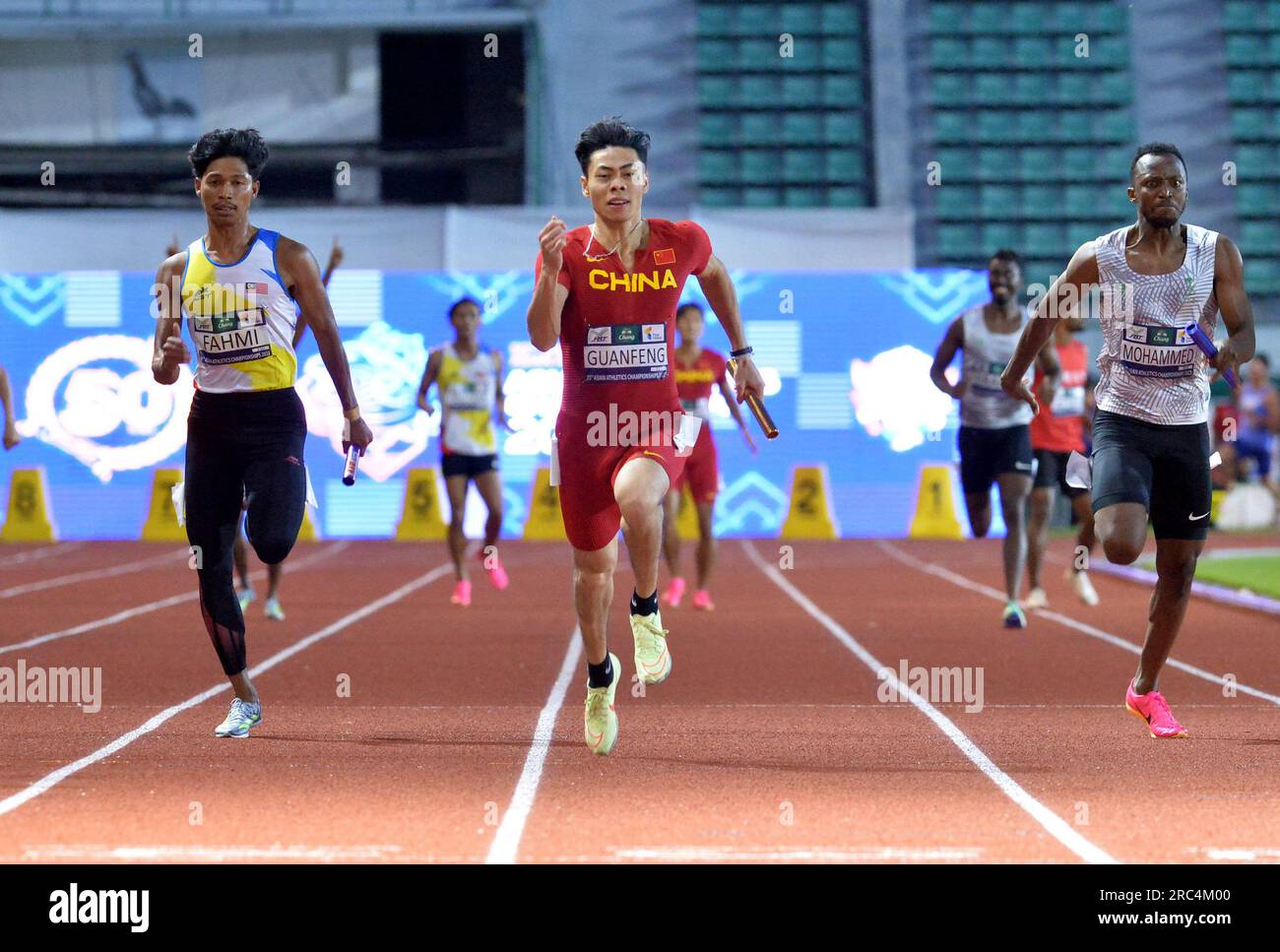 Bangkok, Thailand. 12th July, 2023. Chen Guanfeng (C) of China sprints during the men's 4X100 ...