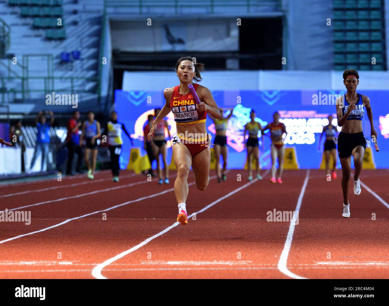 Bangkok, Thailand. 12th July, 2023. Ge Manqi (front) of China sprints ...