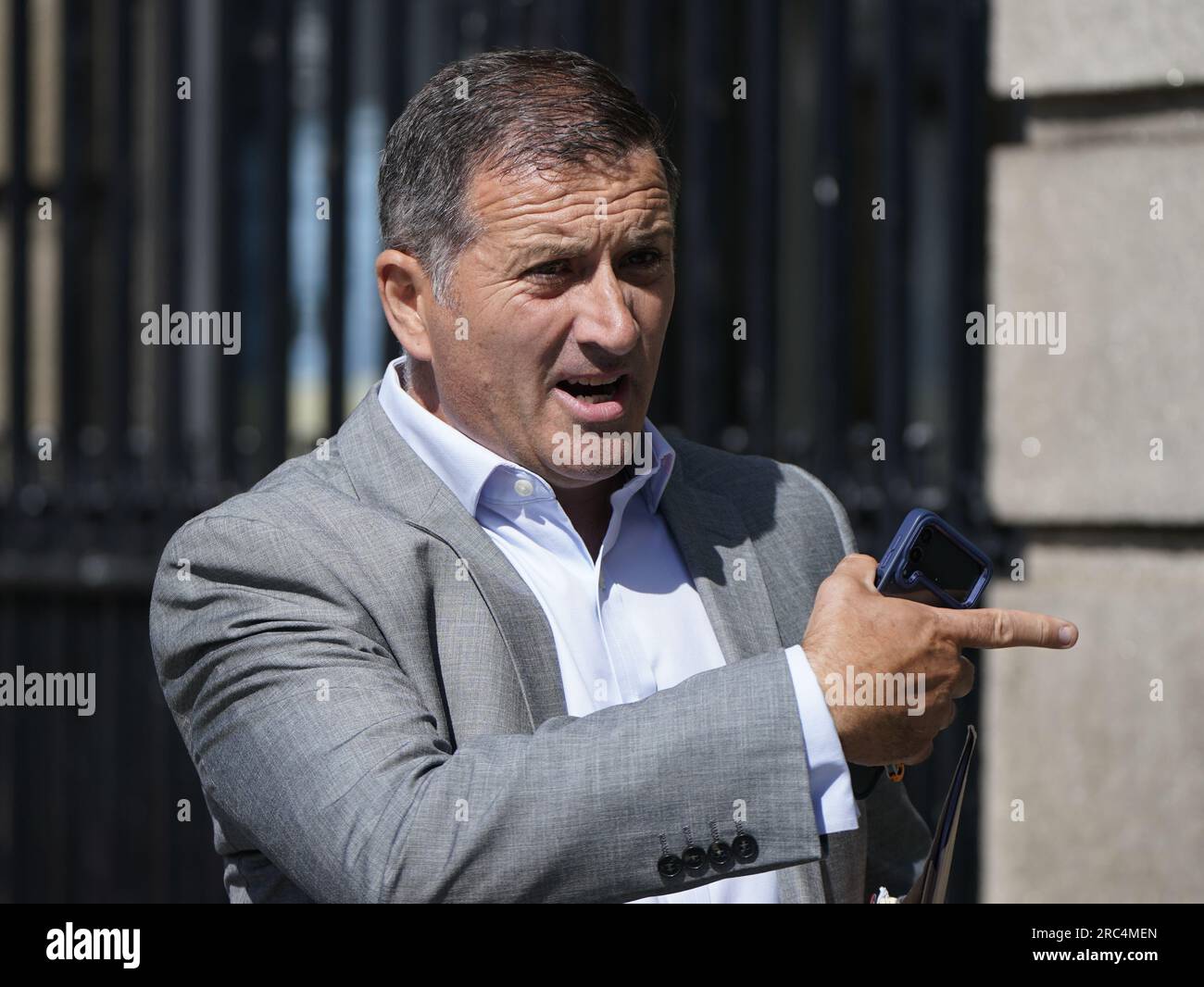 Paul Farrell, managing director of Virgin Media, leaving the committee ...