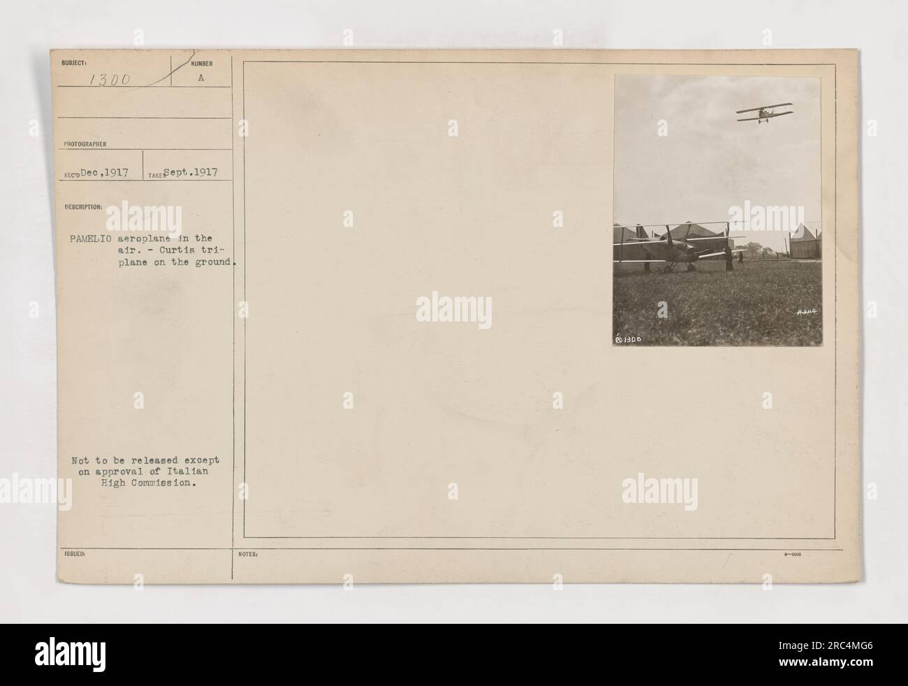 Pamelio airplane in the air, Curtis triplane on the ground. Photograph ...