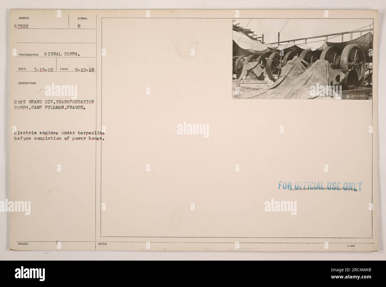 "Electric engines covered by tarpaulins at Camp Pullman, France. This ...