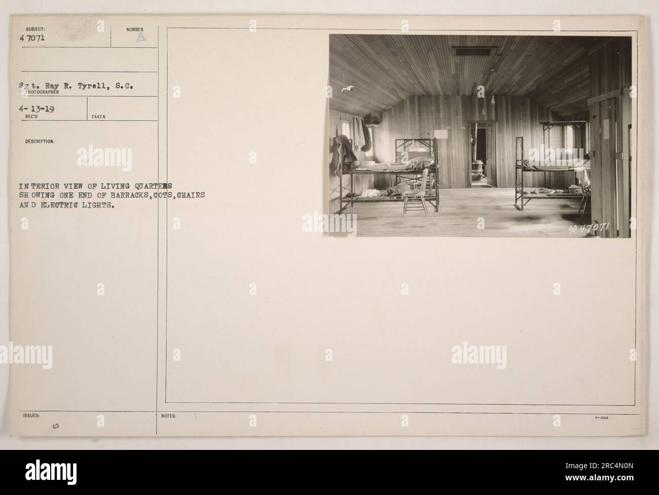 Interior view of a barracks during World War One. The photograph shows ...