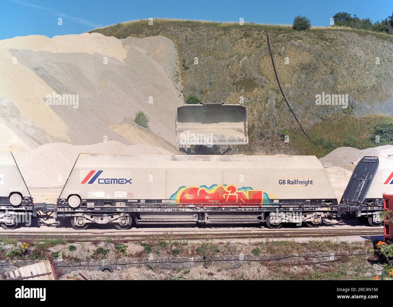 Buxton, UK - 11 August 2022: Aggregate being loaded into the railway ...