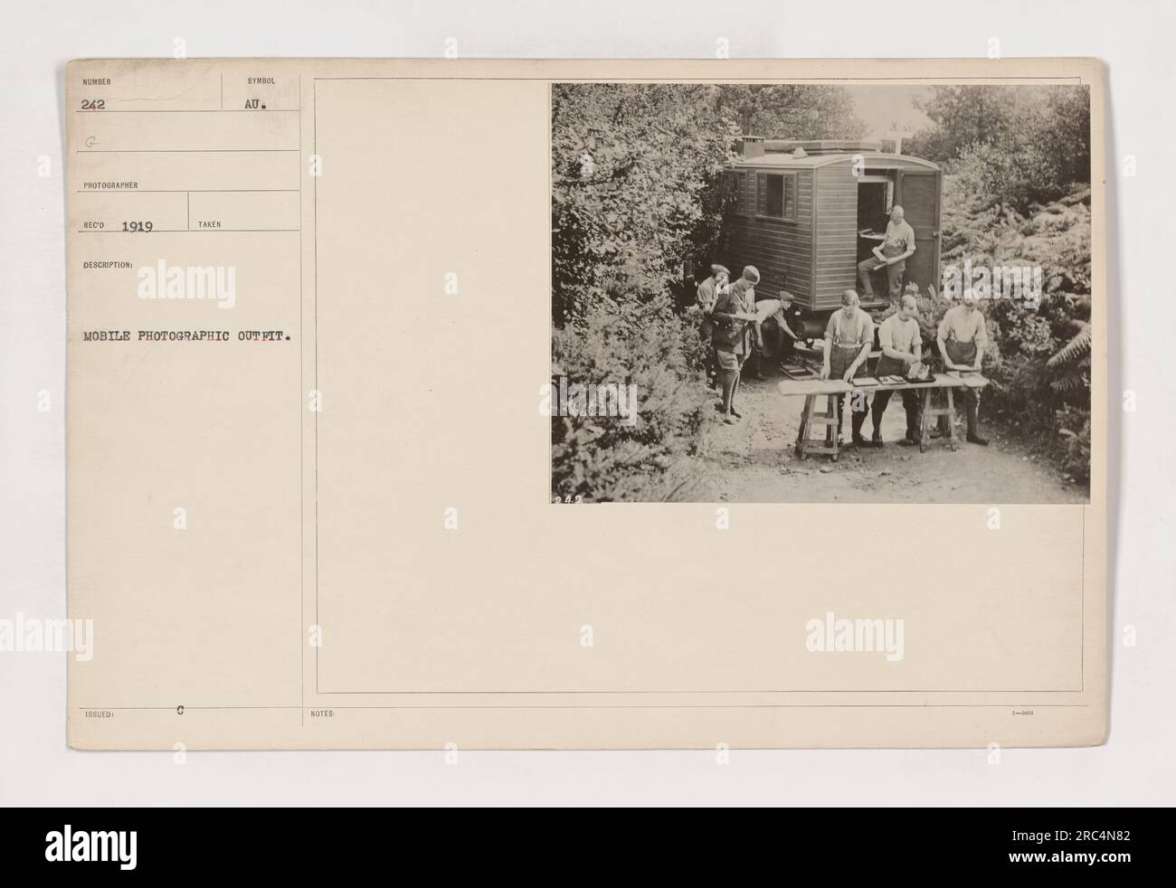 Soldiers operating a mobile photographic processing unit during World ...