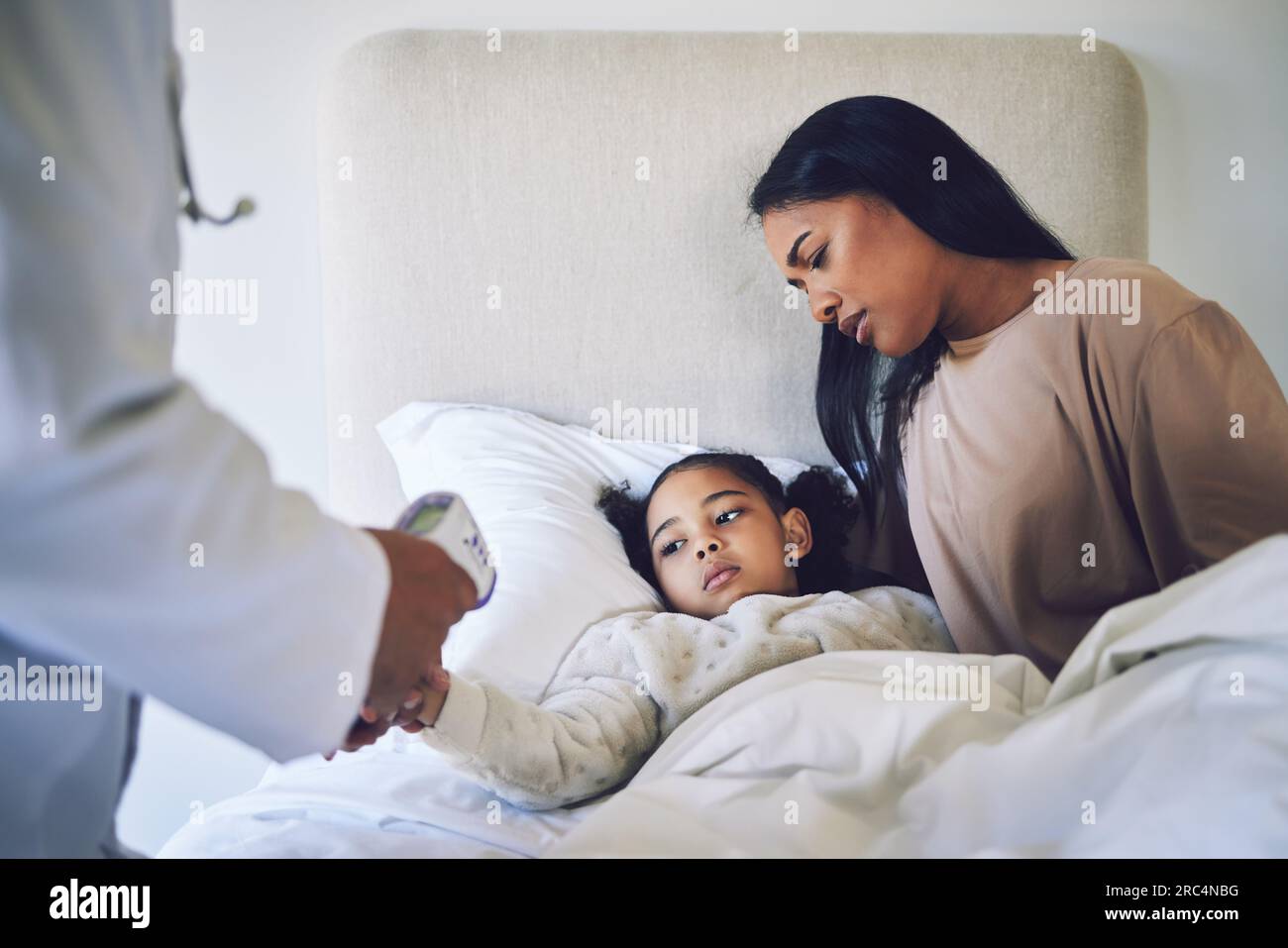 Doctor, mother and daughter with fever, thermometer and check with worry, health and temperature ...