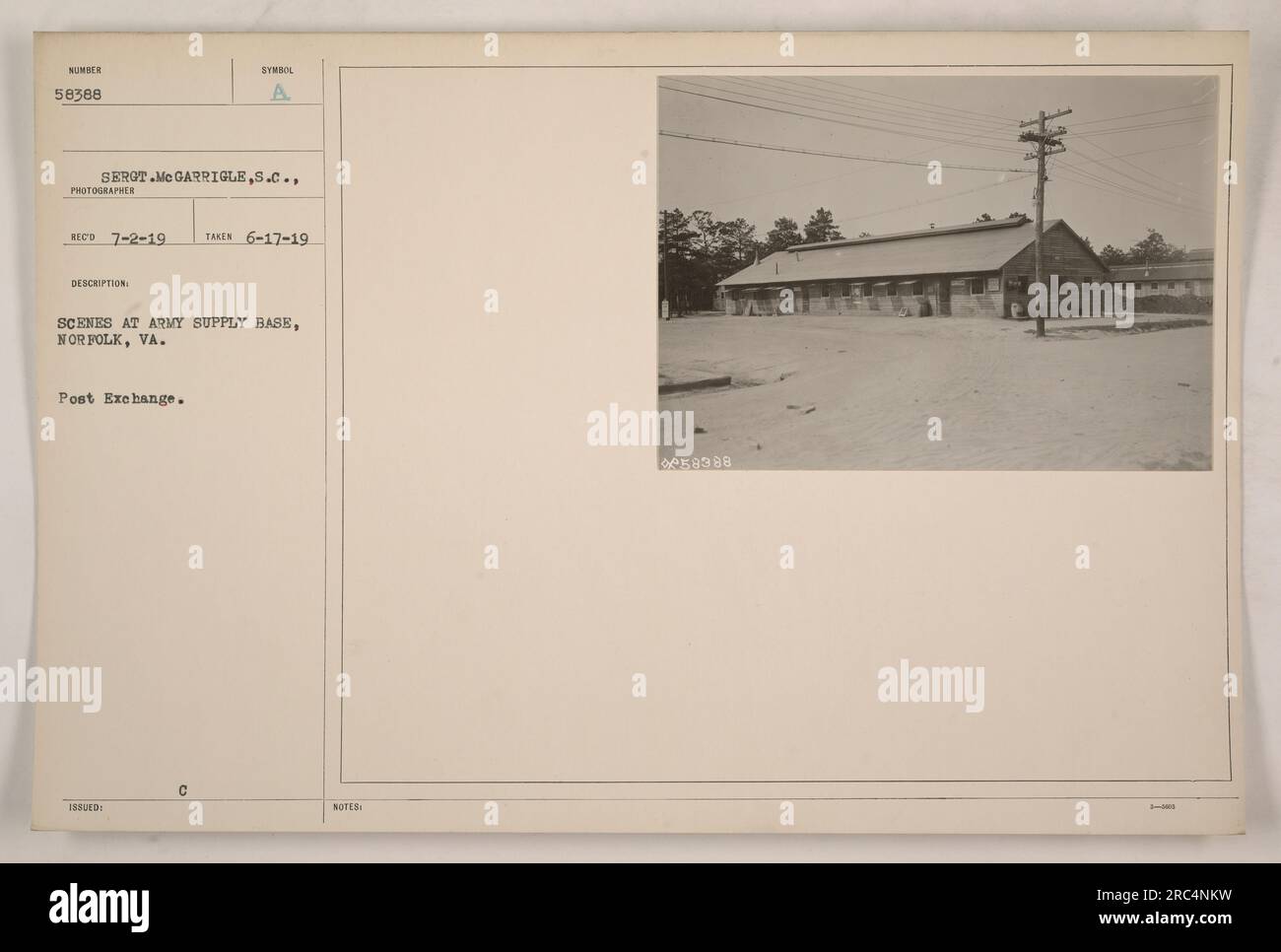 Soldiers lined up outside the Post Exchange at Army Supply Base in ...
