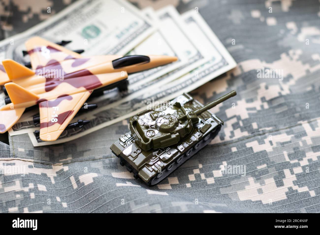 The main battle tank on US dollar bill banknotes background. U.S.A. and ...