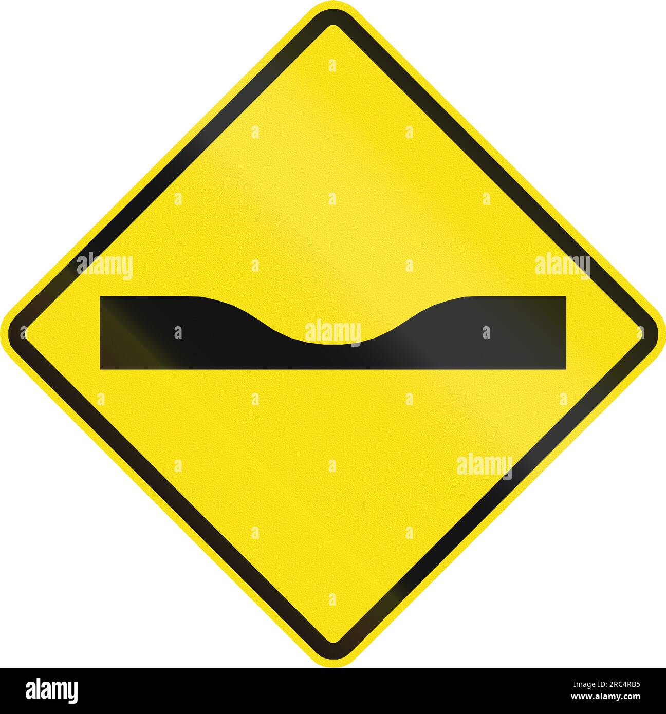 Warning road sign in Chile: Road dip Stock Photo - Alamy