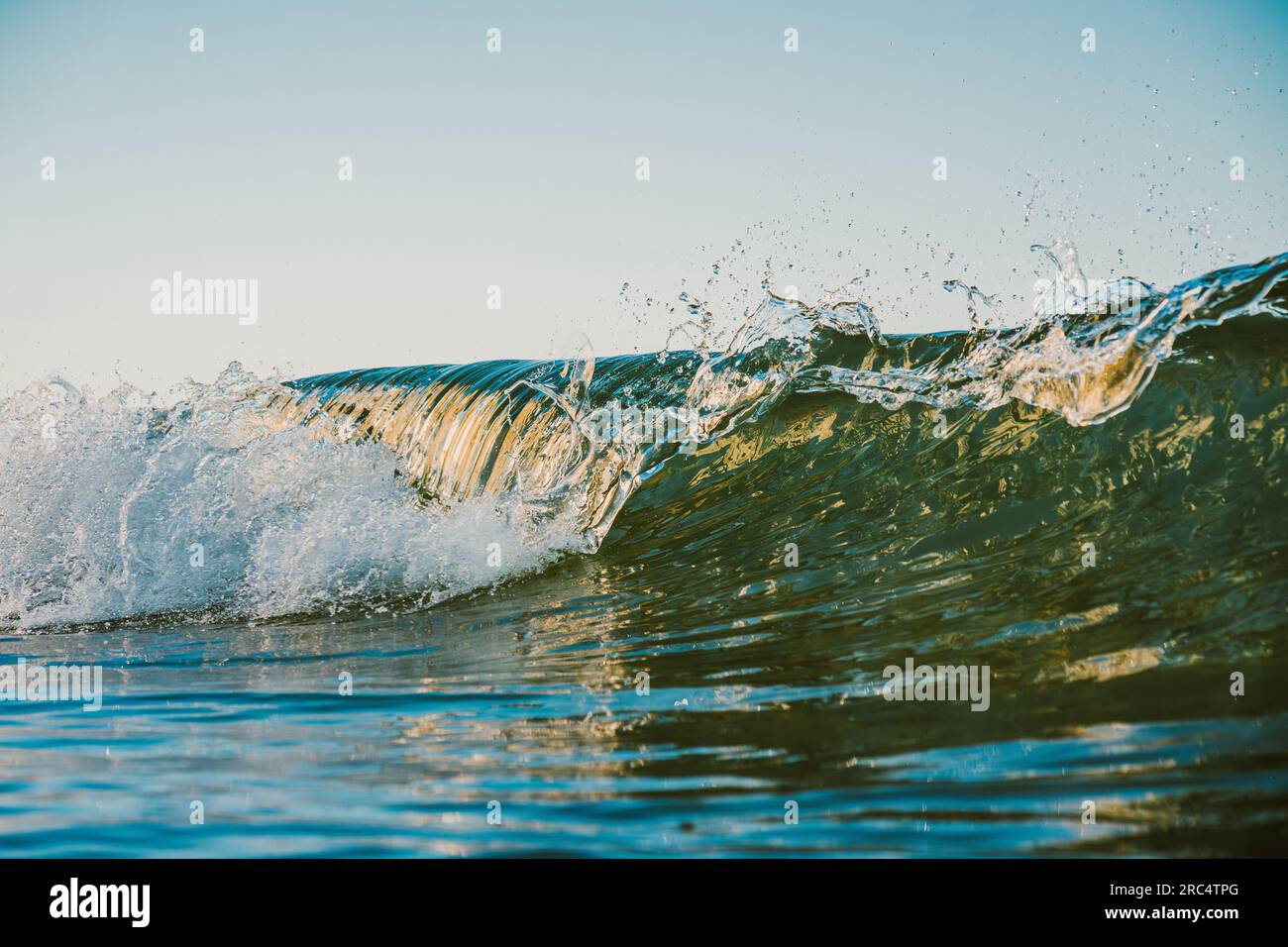 Powerful foamy sea waves rolling and splashing over water surface ...