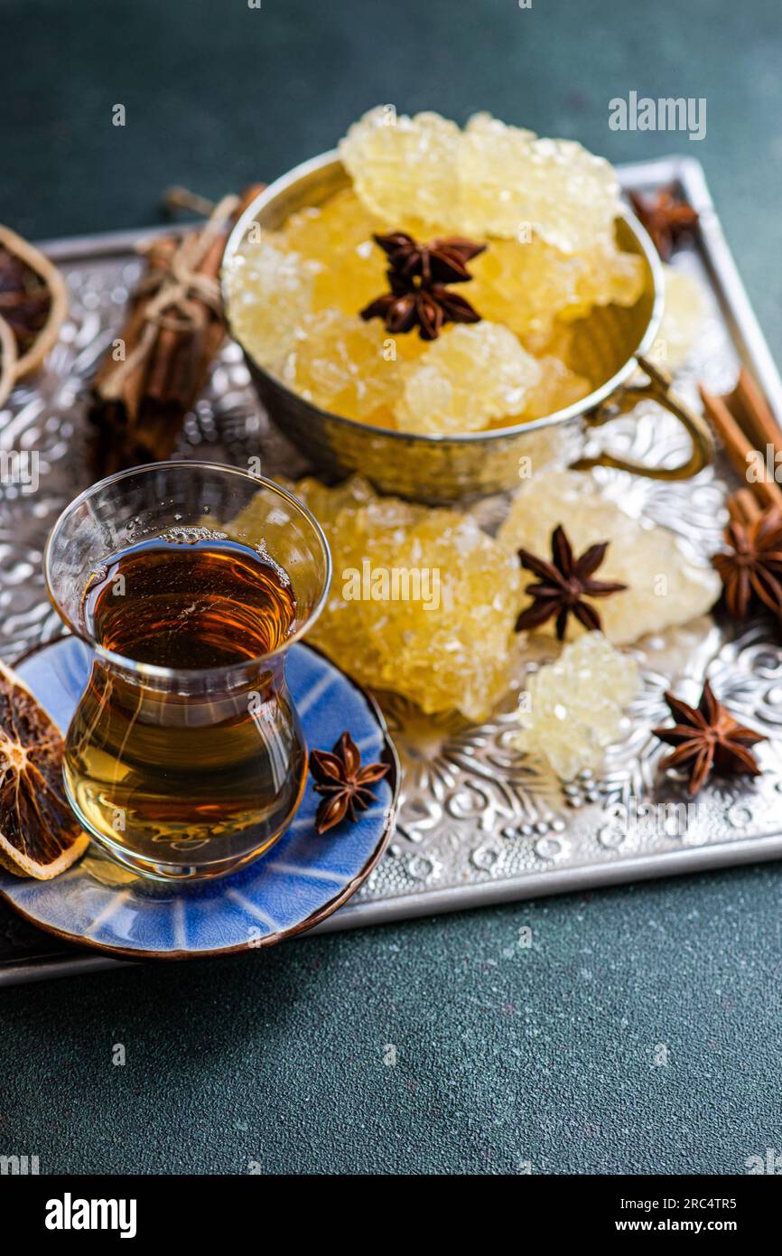 Iranian crystal rock candy and spices in the vintage metal cup Stock ...