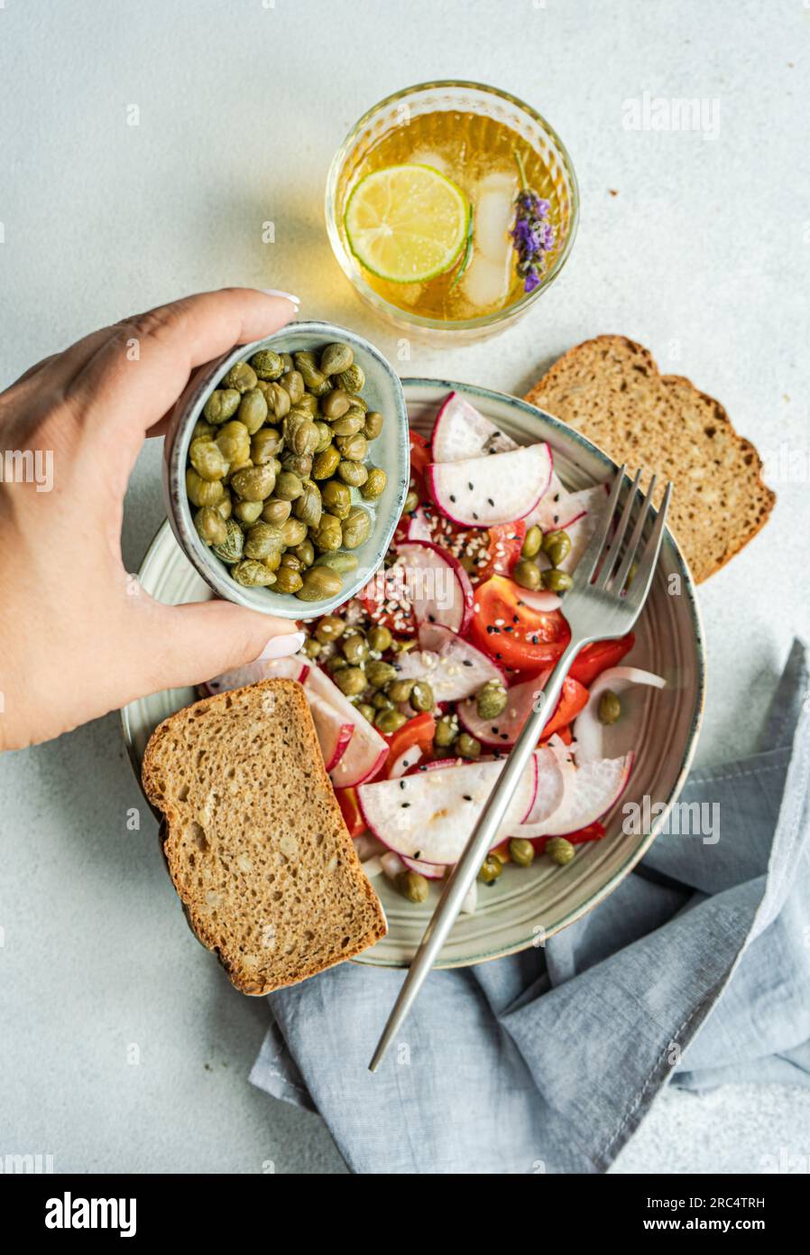 Canned capers hand hi-res stock photography and images - Alamy