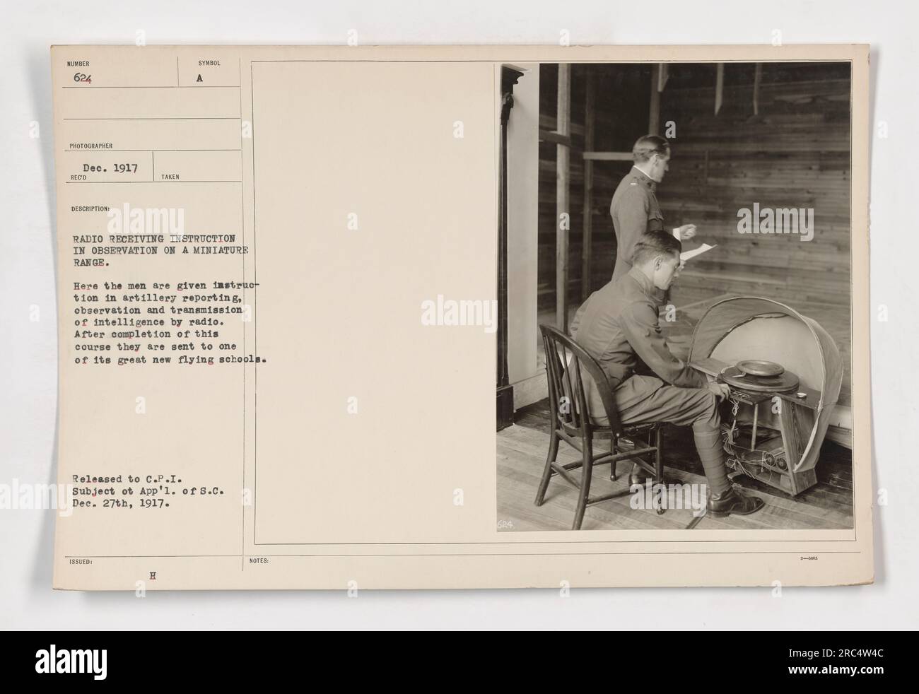 "In this photograph from Dec. 1917, soldiers are seen receiving ...