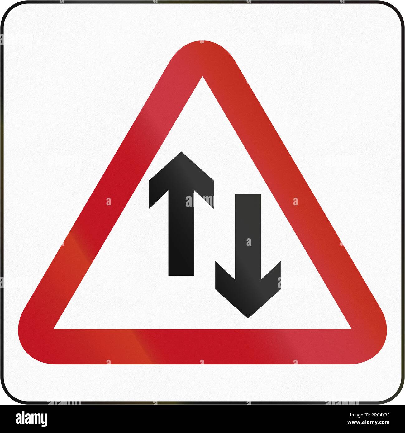 Bruneian sign warning about opposing traffic on a two-way road Stock ...