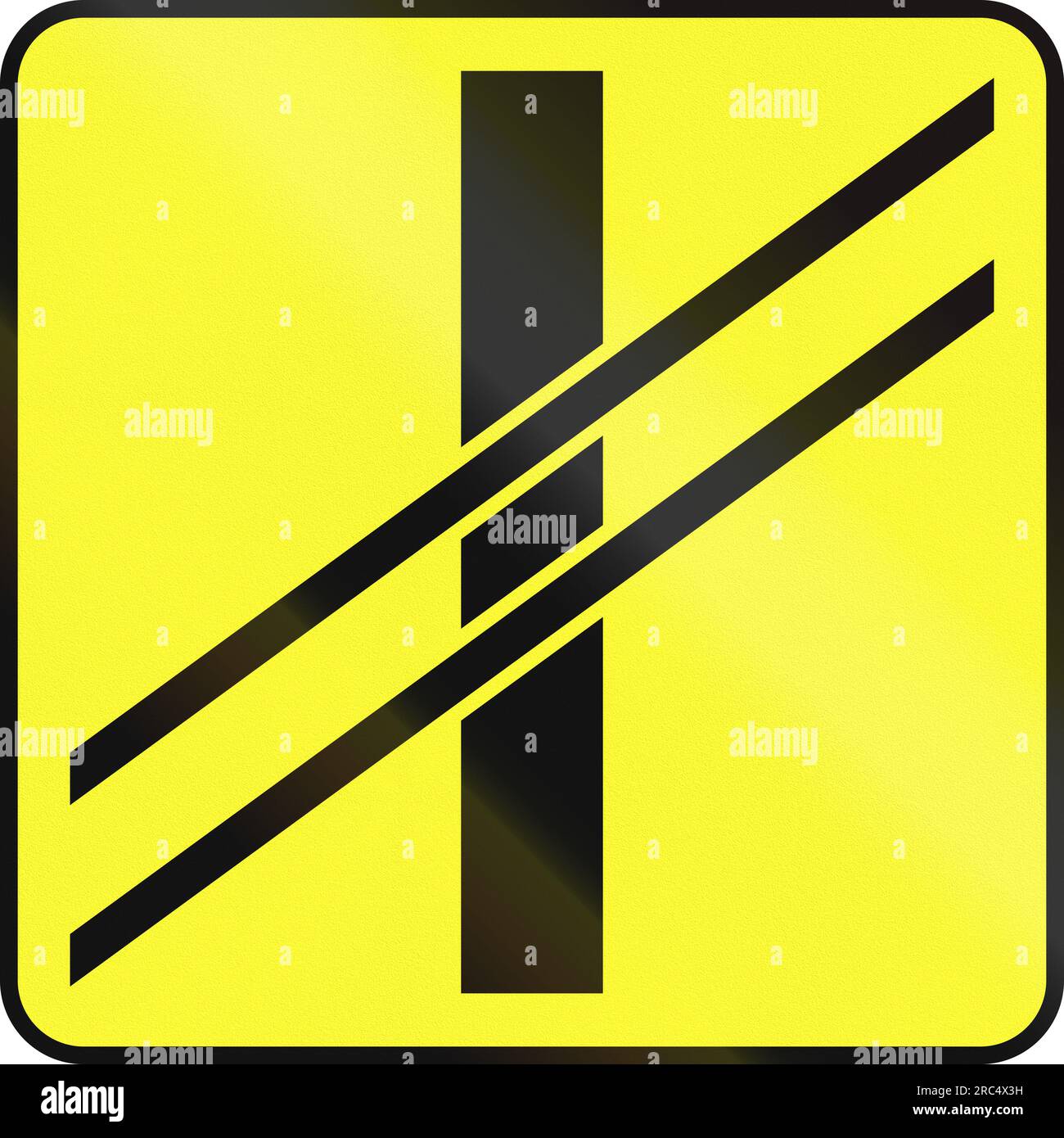 Polish warning sign: Paths crossing road Stock Photo - Alamy