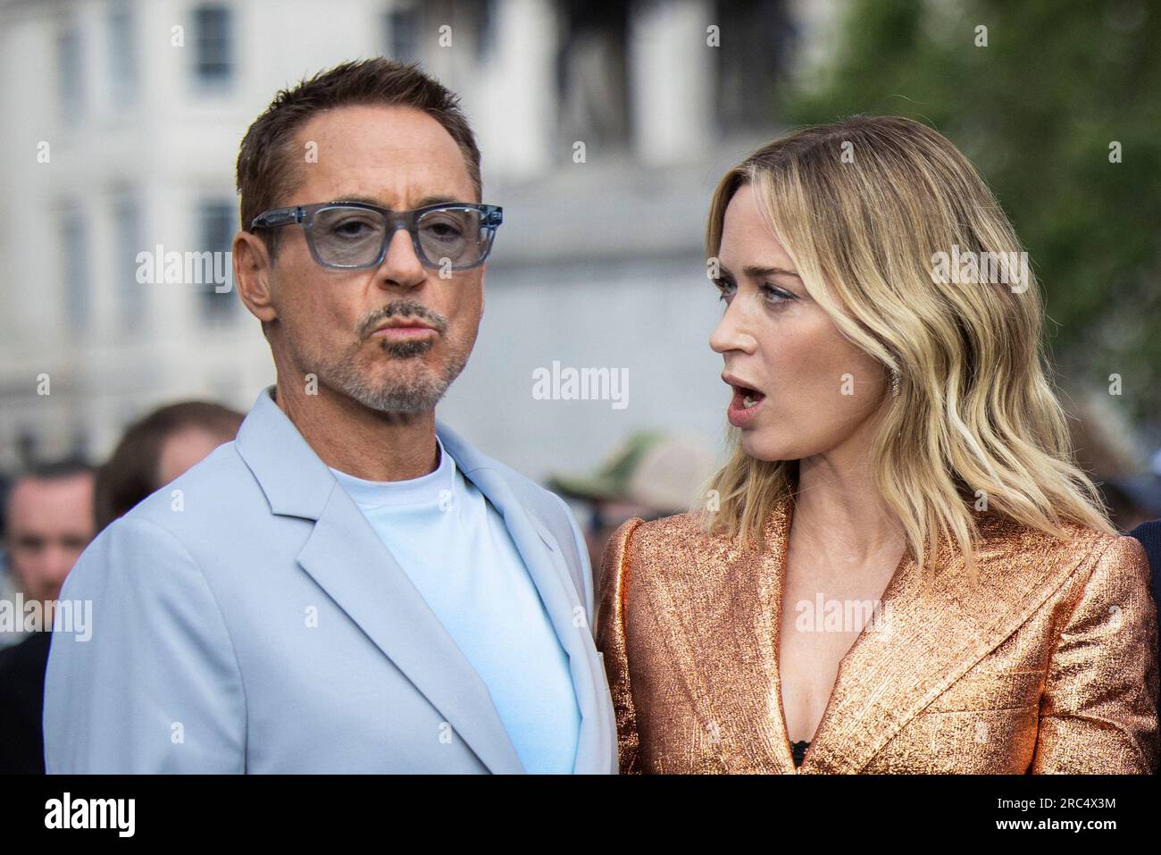 Emily Blunt and Robert Downey Jr. pose for photographers at the photo ...