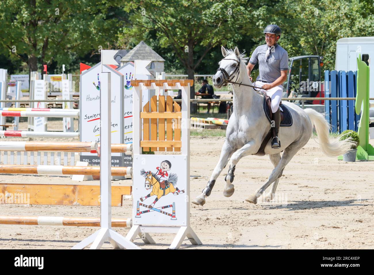 show jumping competition in germany Stock Photo - Alamy