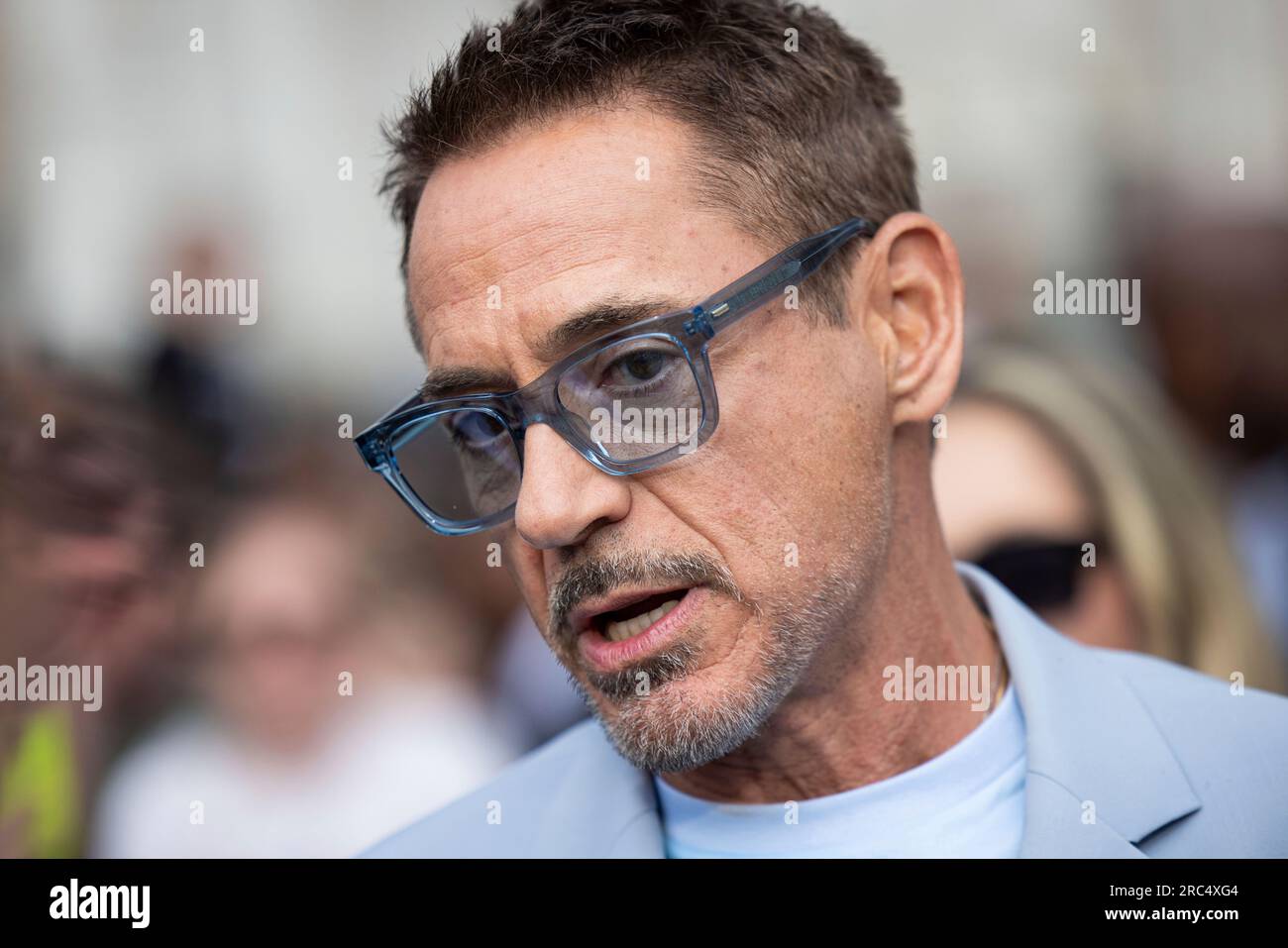 Robert Downey Jr. pose for photographers at the photo call for the film ...