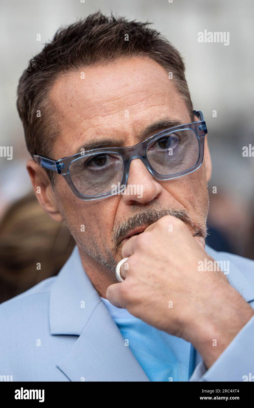 Robert Downey Jr. pose for photographers at the photo call for the film ...