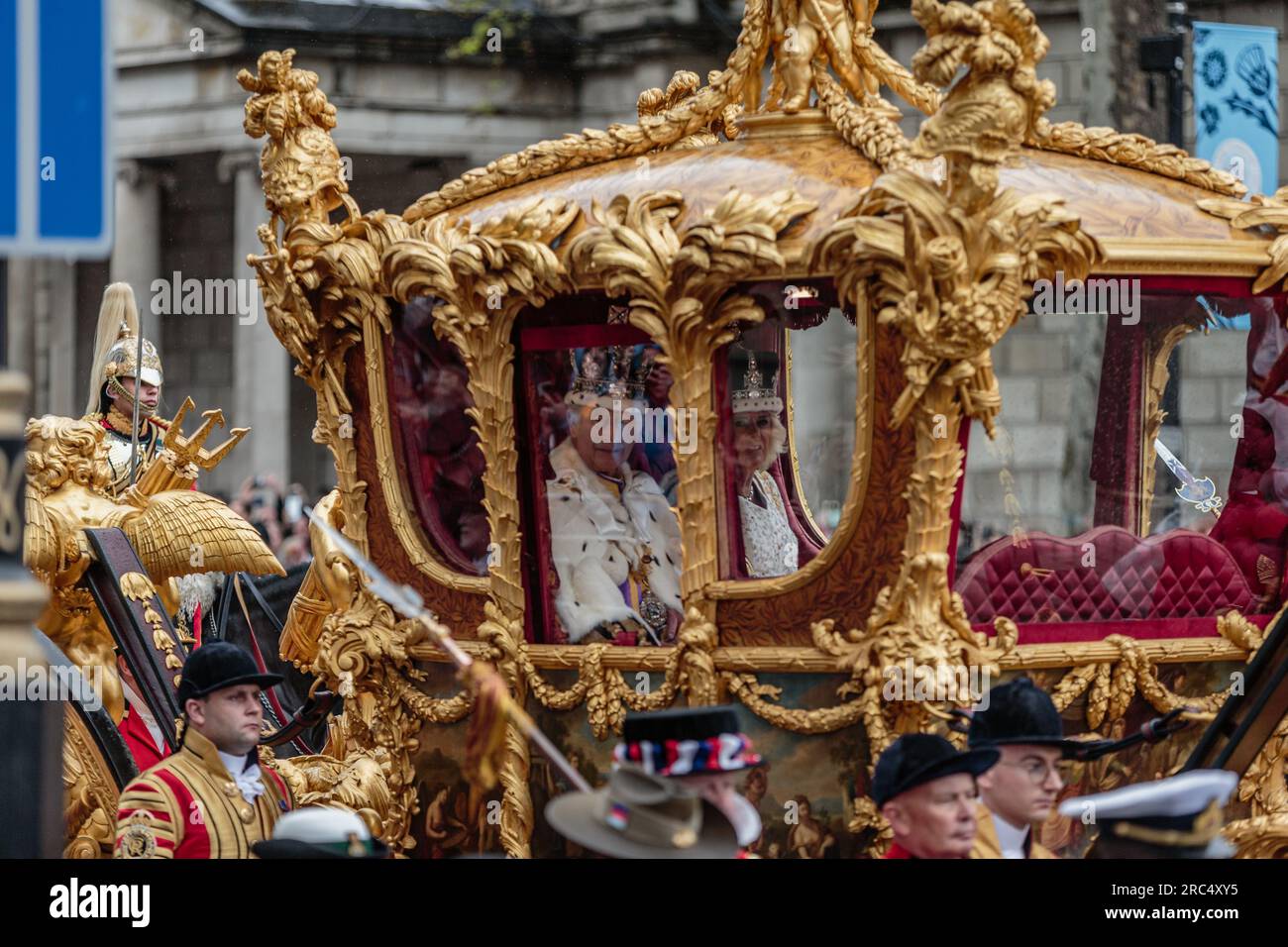 A happy King Charles and Queen Camilla make their way back to ...