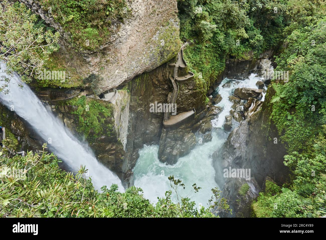 High angle of Cascada El Pailo del Diablo waterfall in Ecuador falling ...